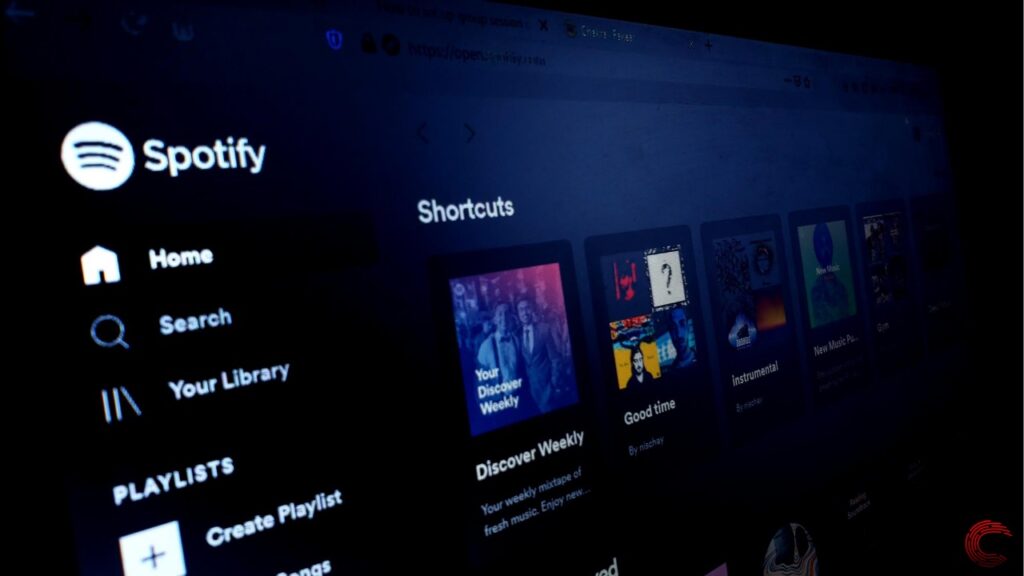 How to set up a group session on Spotify?